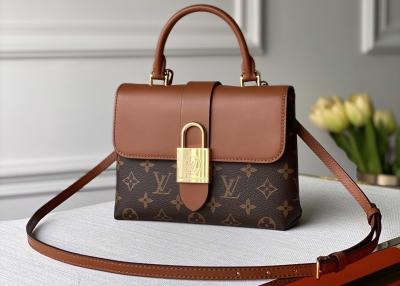 Cina Borsa di lusso del secchio della maniglia nera delle donne con il fermo della serratura in vendita