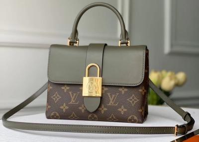 Cina Borsa di lusso del secchio della maniglia nera delle donne con il fermo della serratura in vendita
