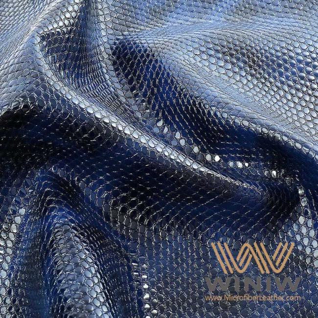 l'unità di elaborazione del Faux di punto culminante di spessore di 1.2mm riveste di pelle con la schiuma del vegano delle borse impressa struttura del coccodrillo