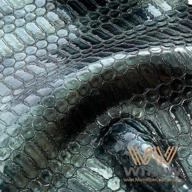 l'unità di elaborazione del Faux di punto culminante di spessore di 1.2mm riveste di pelle con la schiuma del vegano delle borse impressa struttura del coccodrillo