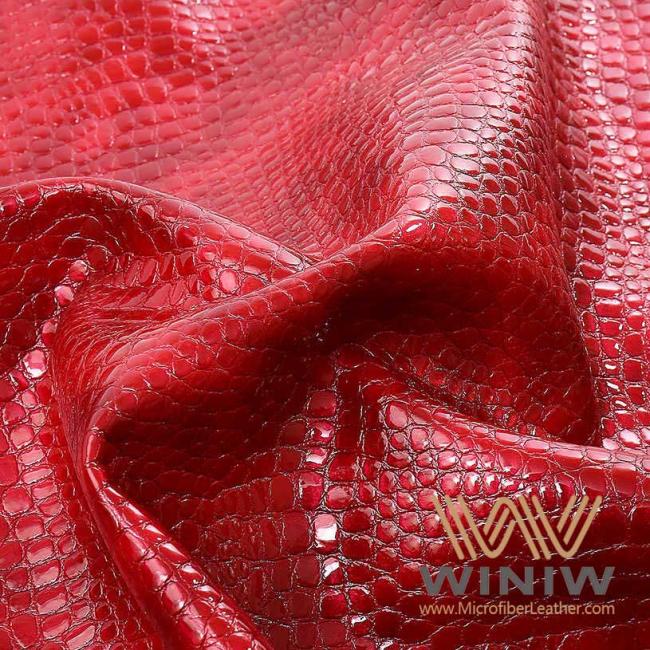 l'unità di elaborazione del Faux di punto culminante di spessore di 1.2mm riveste di pelle con la schiuma del vegano delle borse impressa struttura del coccodrillo