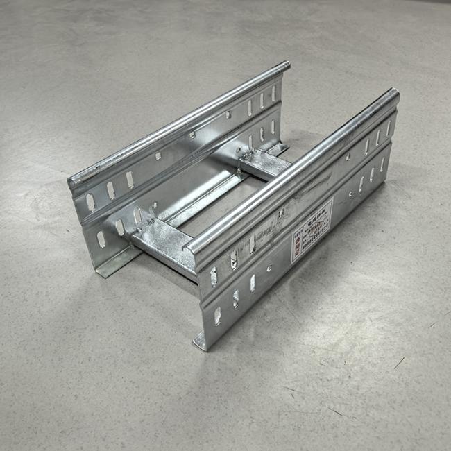 Hot dip galvanized cable tray showing perforated design and zinc coating