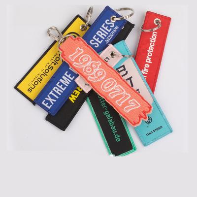 China DANSKY Creative Durable Custom logo Embroidery Shape Key Chain Cheap Fabric Key Ring Patch Key Tag Blank Embroidered Keychain for sale