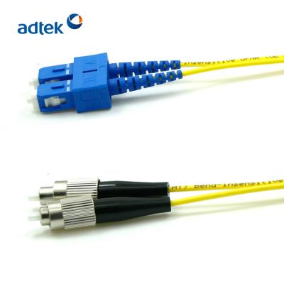 Cina La toppa a fibra ottica monomodale del duplex cabla lo Sc al saltatore del cavo a fibre ottiche di FC in vendita