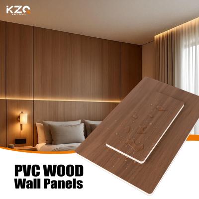 China Bamboo Charcoal Wood Veneer 5mm PVC Wood Grain Wall Panel Sheet For Interior Decor for sale