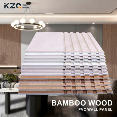 China Indoor PVC Slotted Wood Grain Wall Panel Moisture Proof Bamboo Fiber Wall Panel for sale
