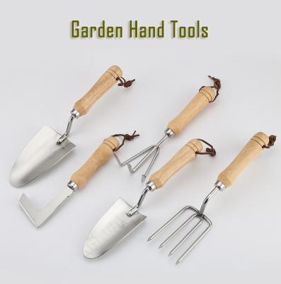 Cina Manico di legno In acciaio inossidabile Strumenti da giardino a mano Set a cinque pezzi in vendita