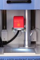 China Enclosed 30W Fiber Laser Marking Machine with Raycus Laser Source for sale