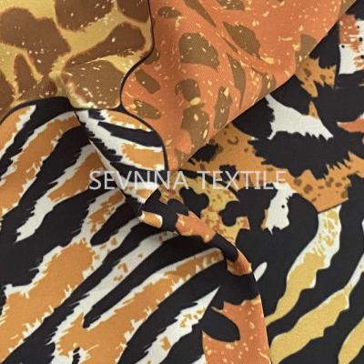 Китай Сублимация напечатала повторно использованное искривление трико ткани материала Swimwear вяжет продается