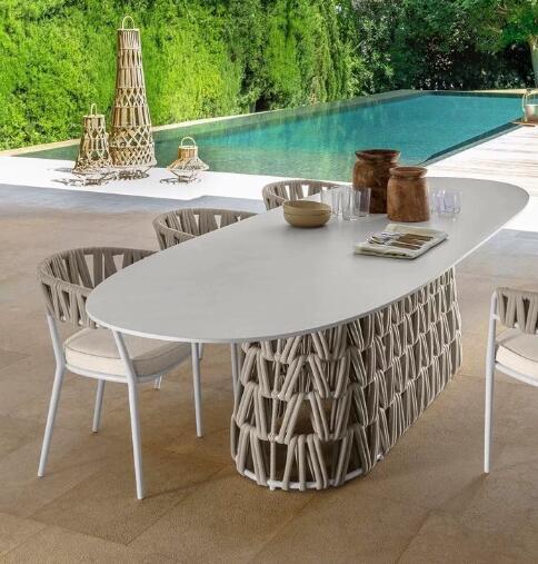 Quality Outdoor table and chair made with weather resistant UV resistant rattan/rope and aluminum frame built for gardens courtyards and villas for sale
