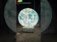 Ethereal Lunar Sculpture: Crater-Textured Moon Statue In Dreamy Blue Gradient​