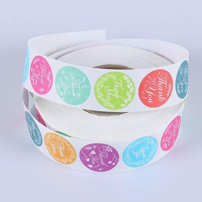 China Strong Adhesion Matte Roll Stock Film Packaging Paper Circle Custom Roll Labels for sale