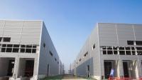 China Customized Galvanized H Section Large Span Steel Structure Warehouse 30m Span for sale