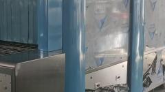 Tunnel-type cage washer for animal laboratory equipment