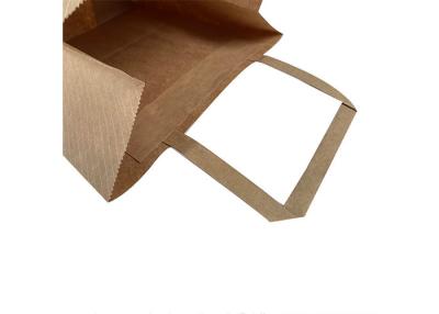 China 150gsm CMYK Bakery Paper Shopping Bags With Flat Handles for sale