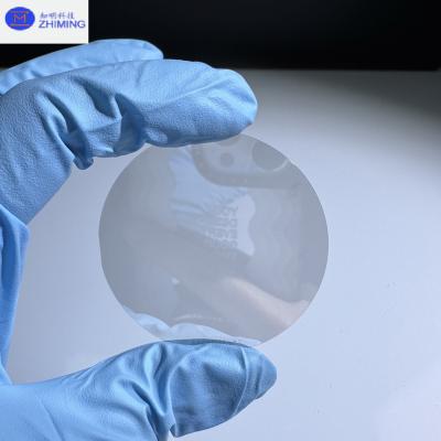 China Silicon Carbide Wafer Customized Size Semi insulating SiC Wafers Nearly Colorless Transparent High Pressure Resistance for sale