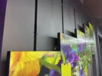 China Wall Mounted Digital Signage Board with Telescopic Lifting Screen 0.01-0.03mm Accuracy 200W-7500W Motor for sale