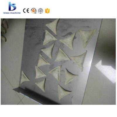 China Dumpling Making Machine for Samosa Empanada 6000pcs/h for sale