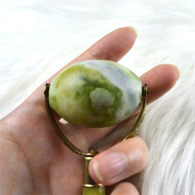 Cina Massaggiatore naturale Xiuyan Guasha Jade Face Roller per donne Massaggio della pelle Relax Muscolo e cura della pelle facciale in vendita