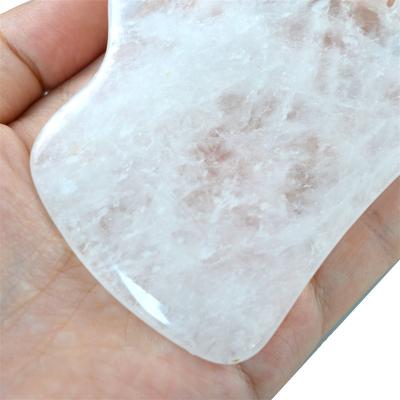 China Duidelijk kwarts Gua Sha-vormig bord gereedschap voor gezicht en nek huid gezondheid OEM/ODM geaccepteerd Te koop