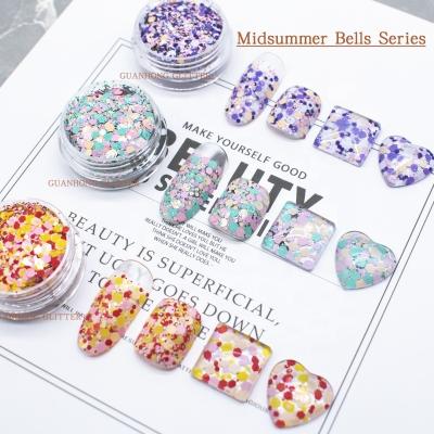 China OEM Shiny Chunky Polyester Christmas Glitter Mix Powder Solvent Resistance Midsummer Bells for sale