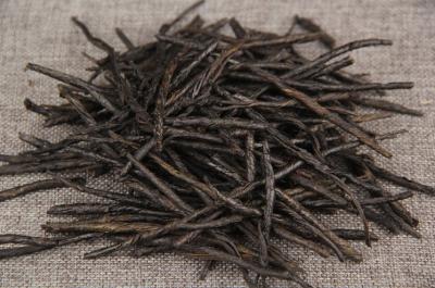 China Yunnan wild leaves kuding tea super high mountain qingshan green water kuding under fire tea taste bitter for sale