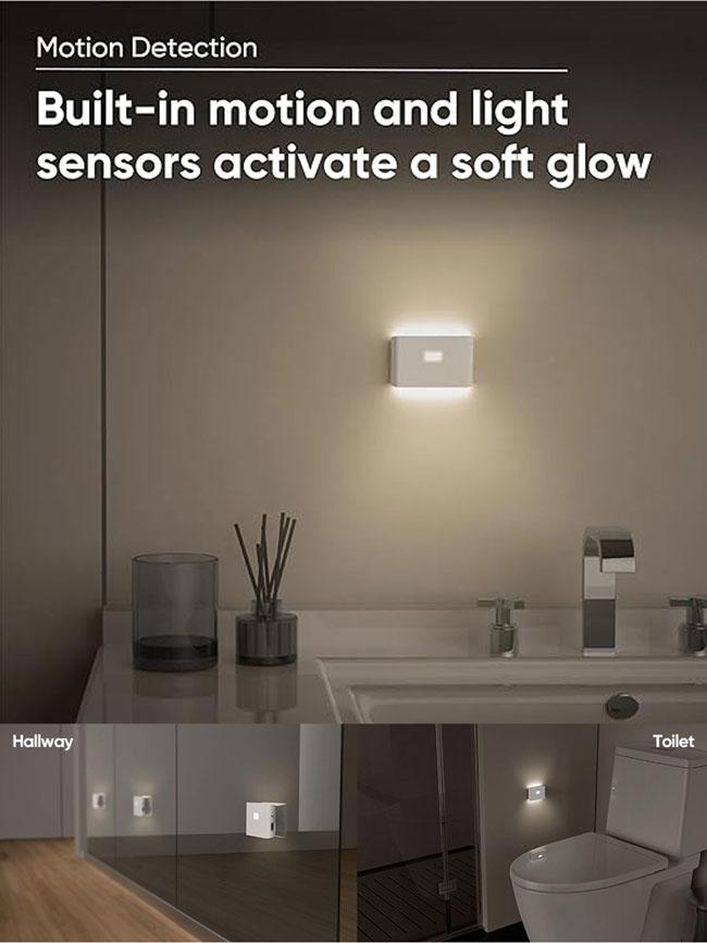 Motion sensor night light illuminating a dark space