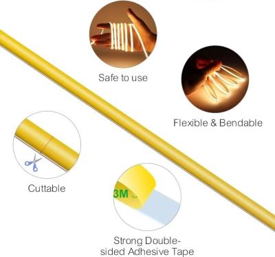 Cina DC 12V 24V 5V Ultra Narrow 3mm Dotless COB LED Strip Light per illuminazione flessibile in vendita