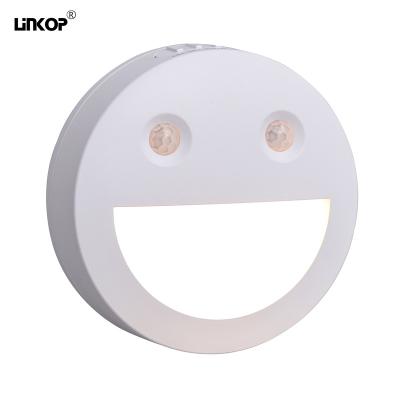 China 3.7V Wireless LED Night Light 16lm Smiling Face Intelligent Induction Night Light for sale
