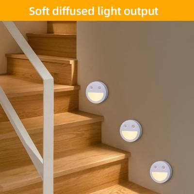 China 3.7V Wireless LED Night Light 16lm Smiling Face Intelligent Induction Night Light for sale