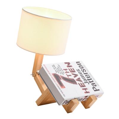 China Robot Shape Wooden Table Lamp Wood Bedside Adjustable Folding Shape Cloth Art Desk Table Lamps for sale