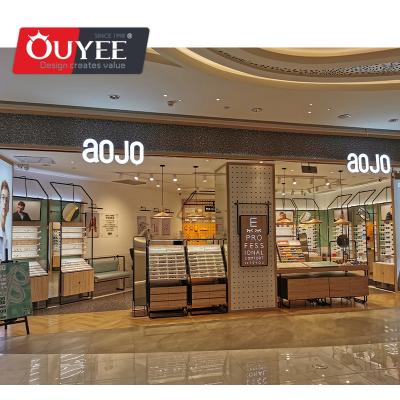 中国 Modern optical store interior decoration designed optical store with retail glasses shop display furniture design 販売のため