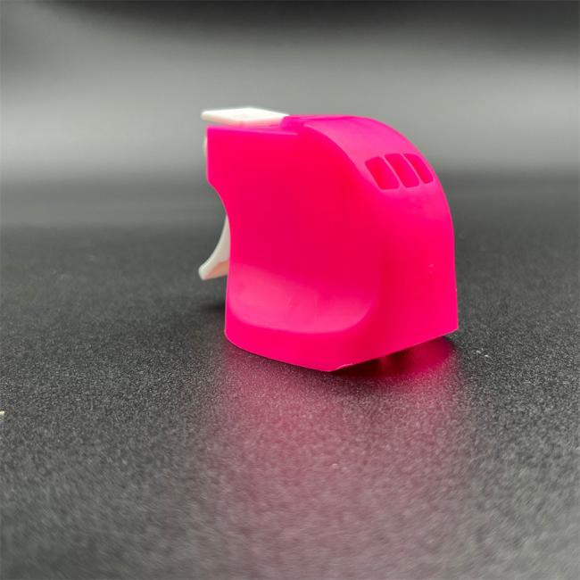 Trigger spray gun in use with fan spray pattern