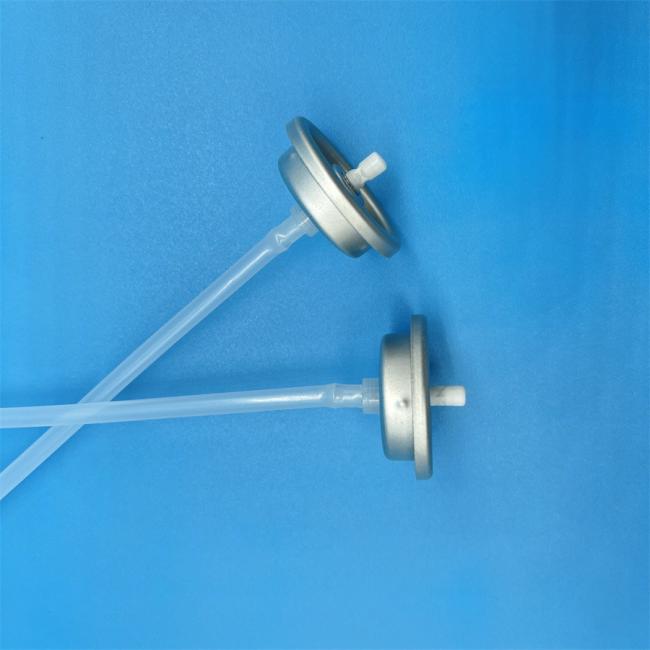 Close-up view of snow spray valve nozzle and internal mechanism