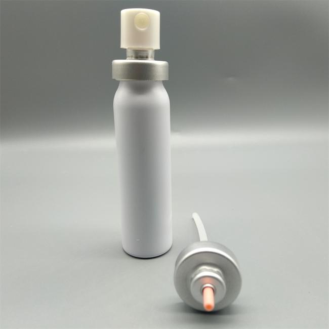 Close-up of self-defence spray valve actuator mechanism