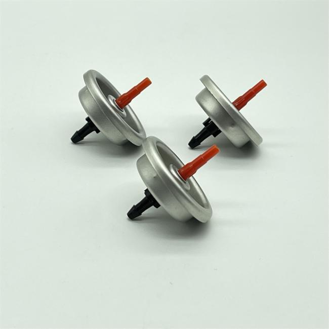 Close-up view of butane gas lighter refill valve