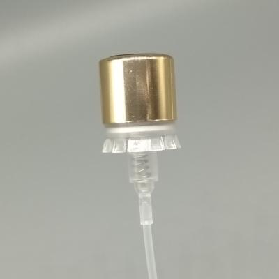 China Golden Perfume Pump Dispenser with Secure Lock Seal for Premium Fragrance Bottles for sale