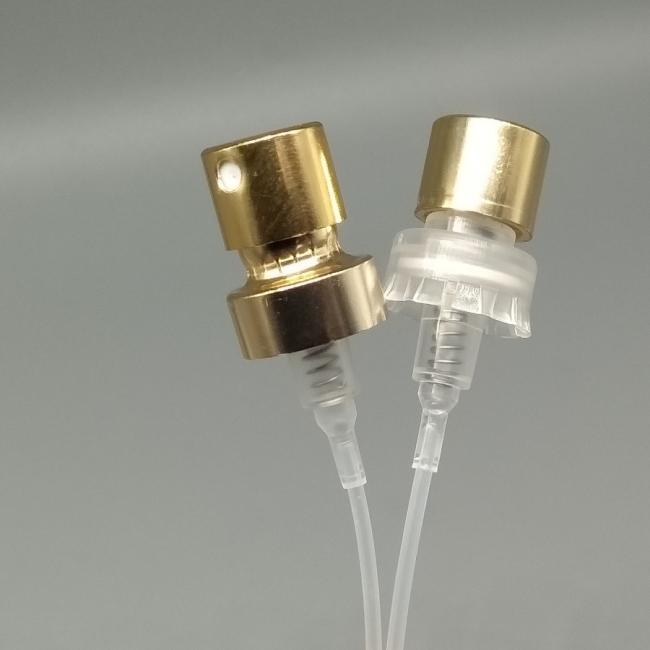 Close-up view of precision perfume pump nozzle mechanism