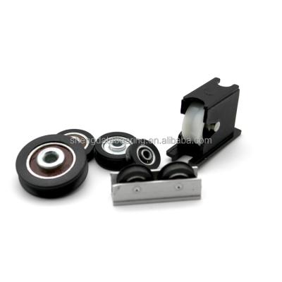 China Self Lubricating Plastic Sliding Door Roller Nylon Window Roller with Metal Shaft for sale