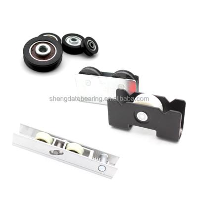 China Nylon Roller Sliding Window Component Plastic Roller Wheel with  Bracket for sale