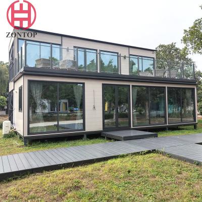 中国 ゾントップの現代軽い鋼鉄は贅沢な構造の完全で大きいモジュラー プレハブの容器の家を組立て式に作った 販売のため