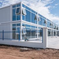 China Prefab Flat Pack Container House  With Glass Curtain Wall for sale