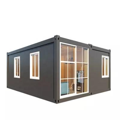 中国 ゾントップの現代安いライト鋼鉄拡張できる具体的なガラス家のプレハブの容器のモジュラー家を組み立てる 販売のため