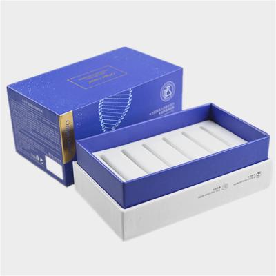 中国 Oem青く白い色の化粧品のペーパー ギフト包装箱CMYKの印刷 販売のため
