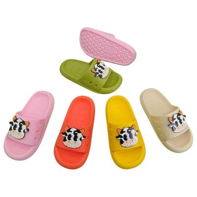 China EVA Kids Cow Decorated Slide Slippers for sale