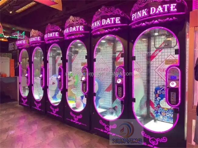 Close-up of prize machine control panel with LCD display