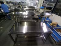 China Stainless steel heavy-duty workbench with casters, movable operation table, workshop assembly table for sale