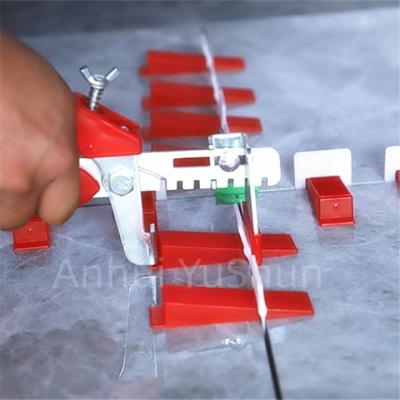 Cina Materiali arancio neri di livellamento degli strumenti pp di colore del pavimento della parete del sistema degli accessori 2mm delle mattonelle per la posizione delle mattonelle in vendita