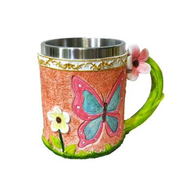 China 400ml flower polyresin double side stainless steel mug for sale