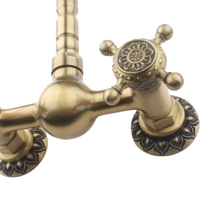 China Modern High Pressure Antique Brass Shower Head Water Saving Handheld Filter with Strainer for Hotel Usage or Home Basin for sale